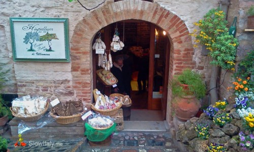 Picturesque grocery shops and other typical food and wine shops across ...